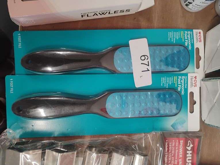 CVS Health Ergonomic Foot File. A stainless steel ergonomic foot file ...