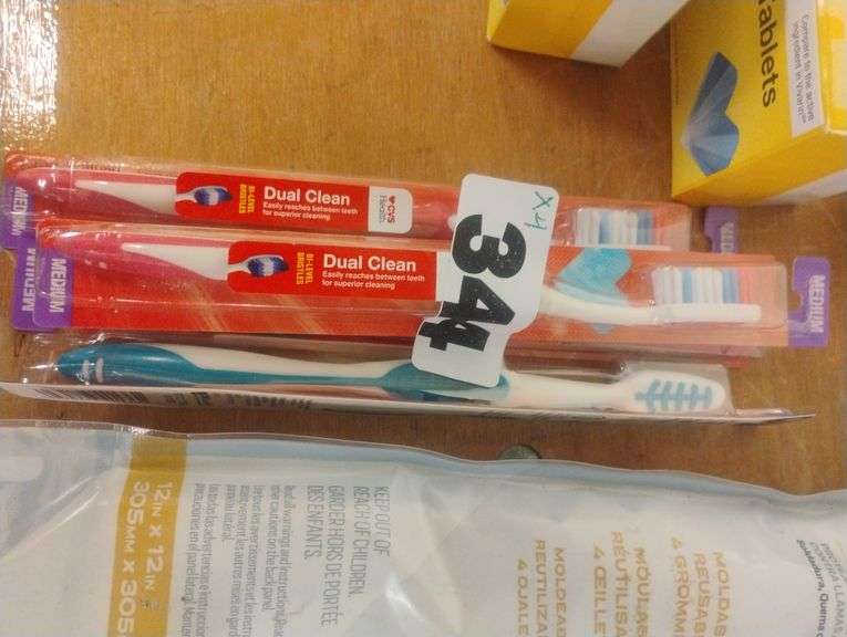 CVS Health Dual Clean Toothbrush, Medium. A manual toothbrush featuring ...