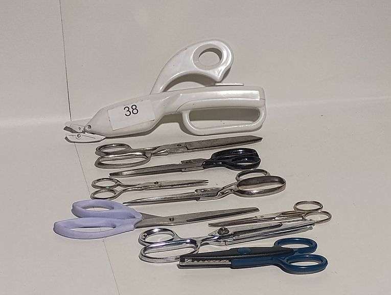 Assorted Lot of Scissors and Multi-Purpose Tool. A collection of ...