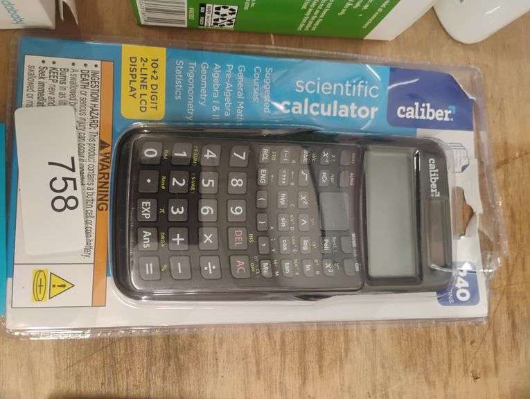 Caliber Scientific Calculator. A scientific calculator featuring a 10+2 ...