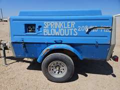 Tow Behind Atlas Copco Air Compressor - Armstrong Western LLC