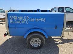 Tow Behind Atlas Copco Air Compressor - Armstrong Western LLC