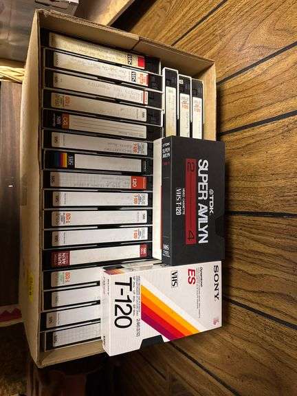 VHS Tapes, 45's, and TEAC VHS Tape Holder with Contents - Auction ...