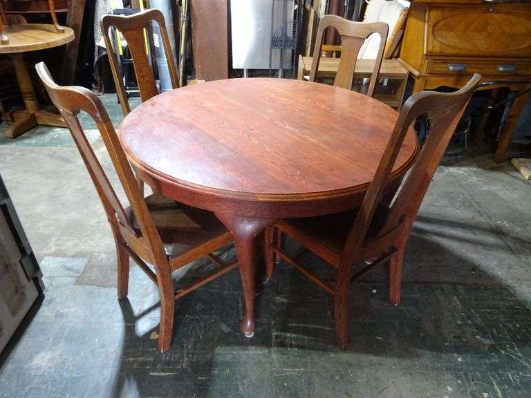 Round cherry wood table and 4 chairs - Auction Solutions Inc