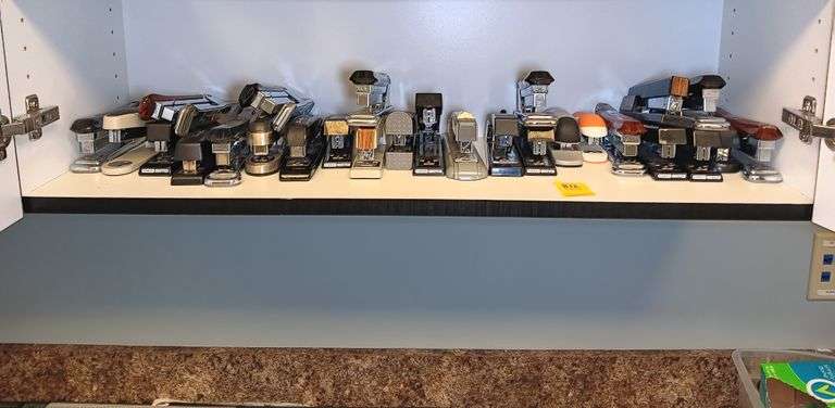 Shelf of Standard Size Staplers - Auction Solutions, Inc - Celebrating ...