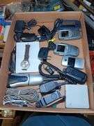 Variety of Cell Phones, Electric Razor, Chargers, and Other Items ...