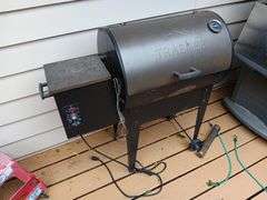 Small Traeger Grill with Cover - Auction Solutions, Inc - Celebrating ...