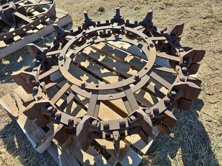 (2) 42" Cut Off?? Steel Spike Wheels - Assiter Auctioneers