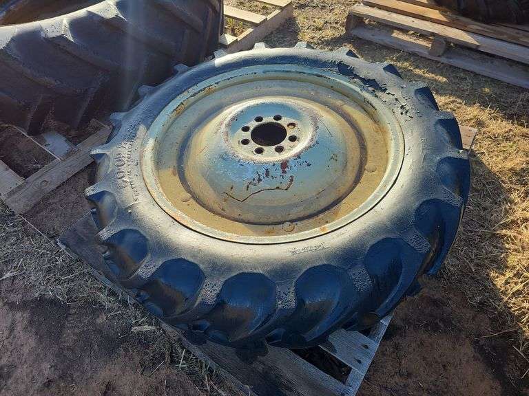 Co-Op Power Plus 11.2 - 28 Tire With 10" 8 Lug Rim - Assiter Auctioneers