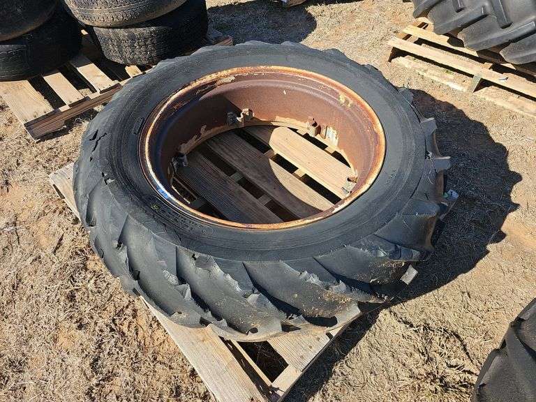 Tuff - Trac 12.4 - 28 4 Ply Tire With Rim - Assiter Auctioneers