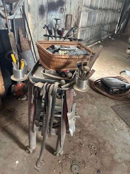 Table with crowbars ,tools, misc - Assiter Auctioneers