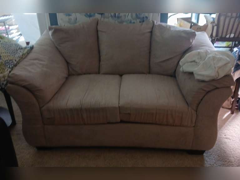Ashley furniture tan 64" W love seat with 2 cushion slip covers and 2 ...
