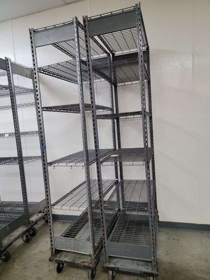 Two equipto storage carts 6 shelves each about 6 1/2 ft tall ...