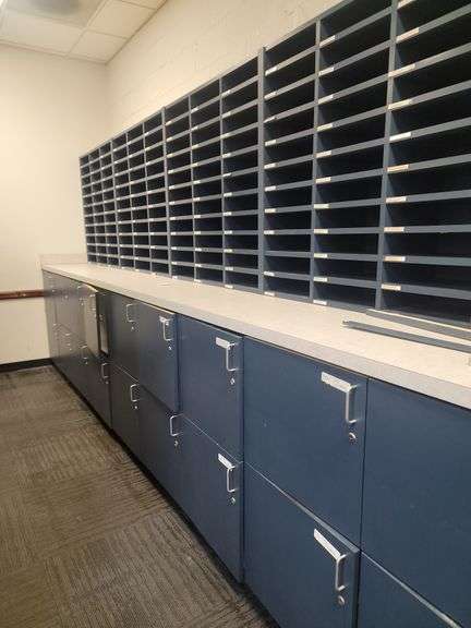 Mail organizer & cabinets will need to be removed by purchaser ...