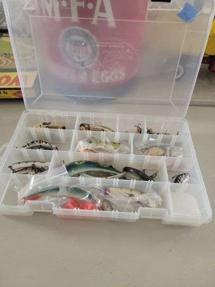 Bass pro container with fishing lures - Advantage Auction