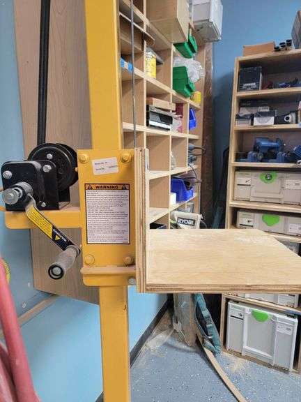 Yellow Manual Lift with Wooden Platform - Advantage Auction