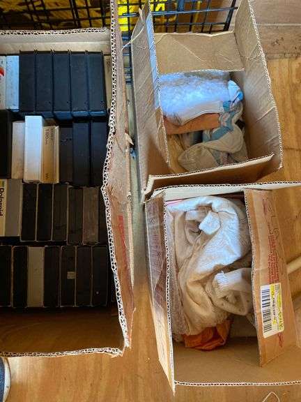 Multiple VHS tapes and Textiles in Assorted Boxes - Advantage Auction