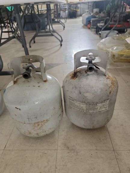 Two Empty propane bottles - Advantage Auction