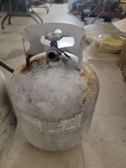 Two Empty propane bottles - Advantage Auction