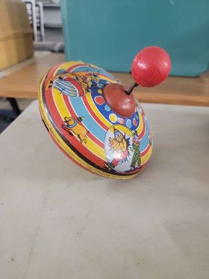 Vintage spring tin top - Advantage Auction