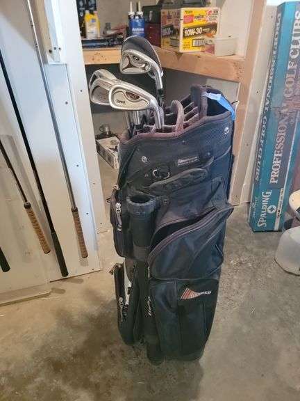 Golf bag with assorted irons - Advantage Auction