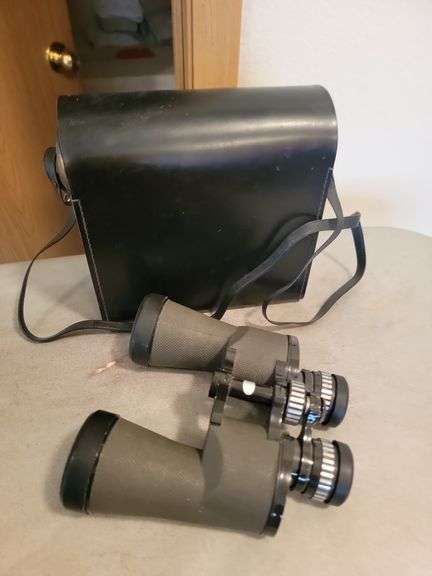Kmart focal brand binoculars in a black case - Advantage Auction