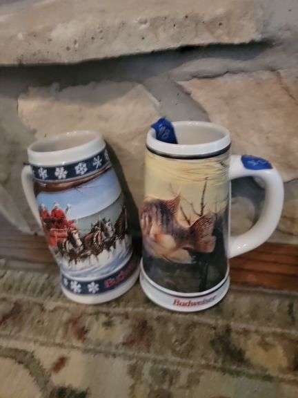 Two beer steins ,Budweiser crappie, and Budweiser 1995 lighting the way ...
