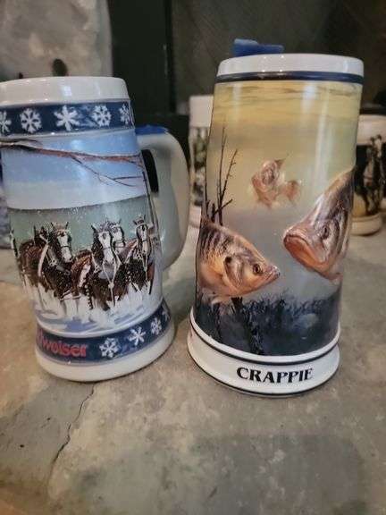 Two beer steins ,Budweiser crappie, and Budweiser 1995 lighting the way ...