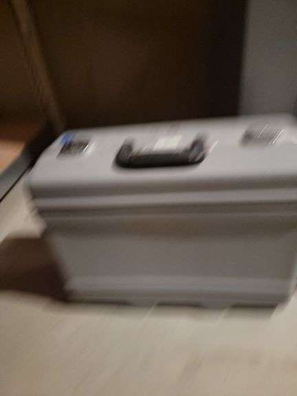Travel suitcase - Advantage Auction
