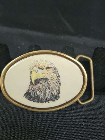 Brass and bone belt buckle with eagle head image - Advantage Auction