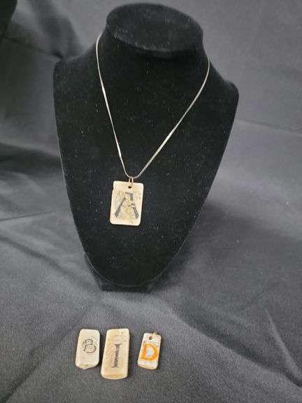 Ivory monograms and chain - Advantage Auction