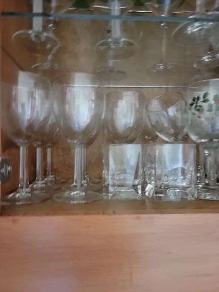 Drinking glasses bottom shelf - Advantage Auction