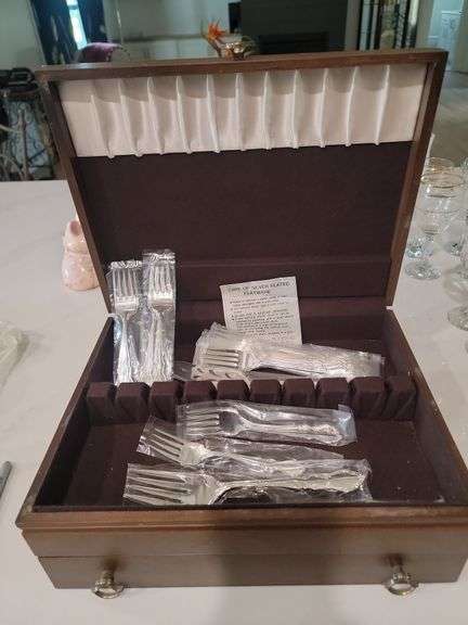 Silver plated flatware in case - Advantage Auction