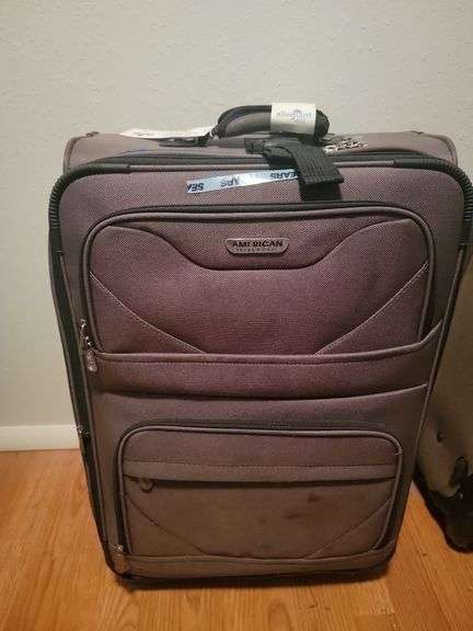 Brown American suitcase - Advantage Auction