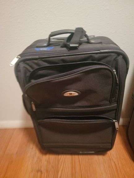 Black small suitcase - Advantage Auction
