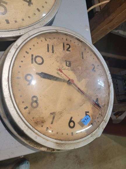 Edwards Electric Wall Clock with Metal Frame - Advantage Auction