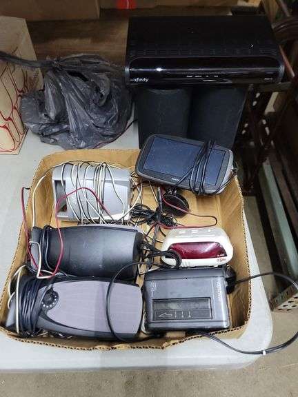 TOM TOM Gps- Walk man- computer speakers- alarm clock- xfinity Box ...