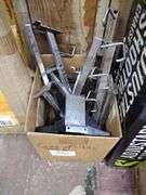 Three Wire Wall Racks With Box of Hangers. Approx 60"x 24" on 2 Racks ...