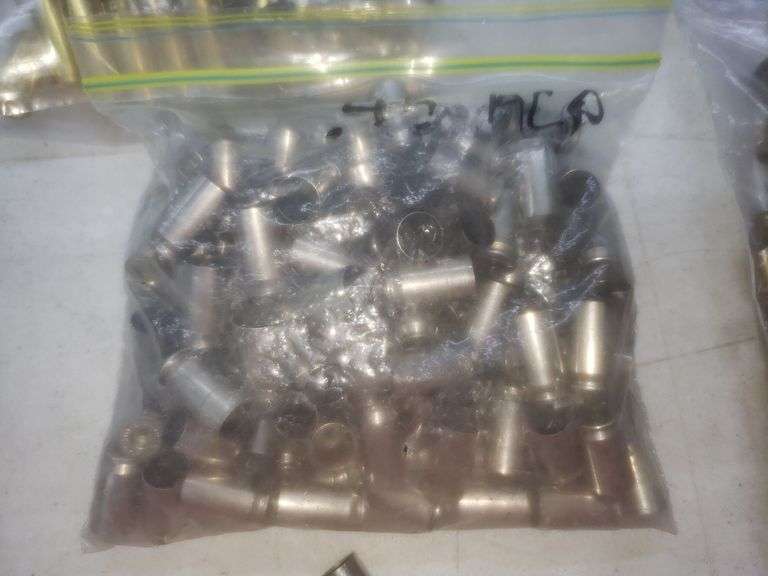 Bucket And Bag Of .45 ACP Auto Brass - Baer Auctioneers - Realty, LLC