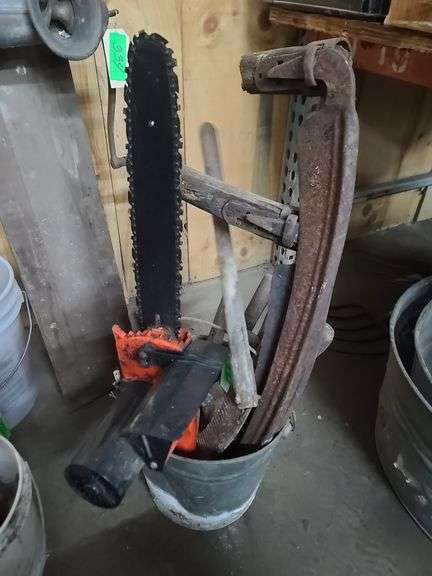 Galvanized Bucket with Assorted Scythe Blades and Electric Chainsaw ...