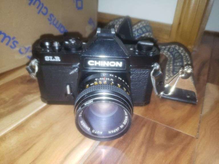 Chinon SLR Camera, Attachment, And Leather Case - Baer Auctioneers ...