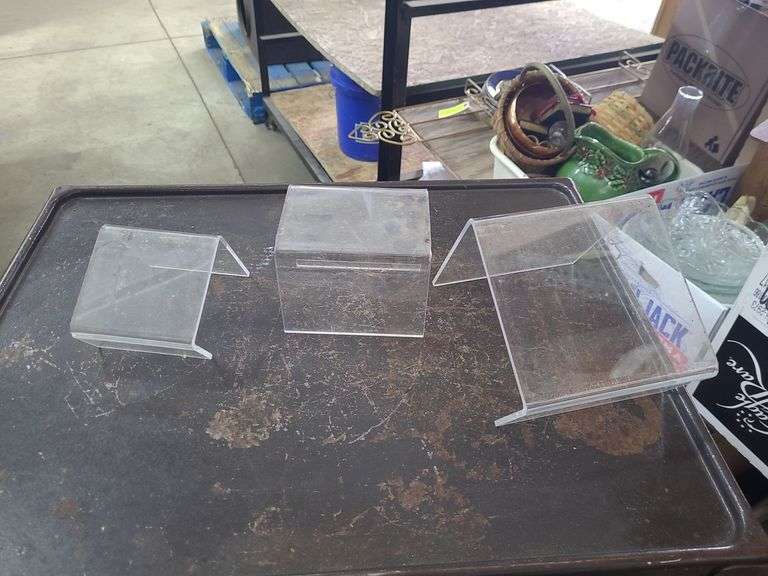 Tote of Plastic Display Stands - Baer Auctioneers - Realty, LLC