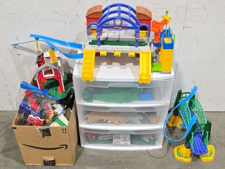 Plastic Storage Unit & (2) Boxes of GeoTrax - Black And Gold Auctions