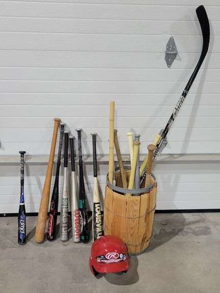 Barrel Of Metal & Wooden Bats, Helmet & Hockey Stick - Black And Gold ...
