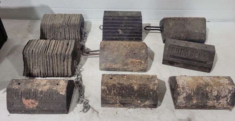 (9) Trailer Wheel Blocks - Black And Gold Auctions