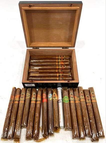 Camacho Cigar Box Full of Mixed Cigars - Black And Gold Auctions