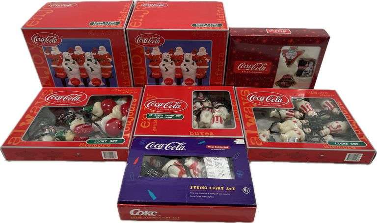 (7) Boxes of Coca-Cola Sting Lights - Black And Gold Auctions