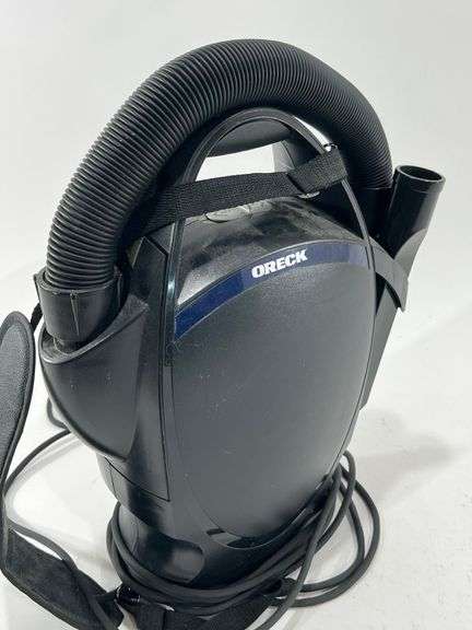 ORECK Hand Held Bagged Canister Vacuum - Black And Gold Auctions