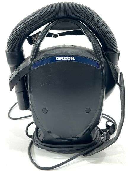 ORECK Hand Held Bagged Canister Vacuum - Black And Gold Auctions
