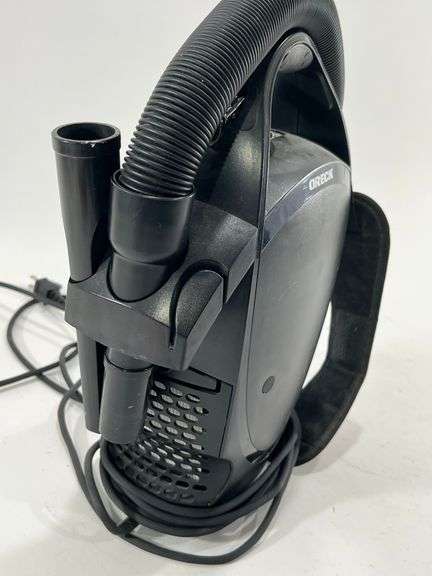 ORECK Hand Held Bagged Canister Vacuum - Black And Gold Auctions